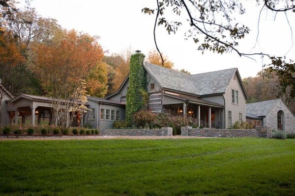 Charming historic farmhouse in Tennessee with a peaceful forest backdrop