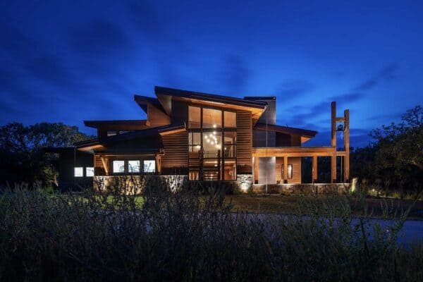 A modern timber frame home in a serene woodsy setting of Nebraska