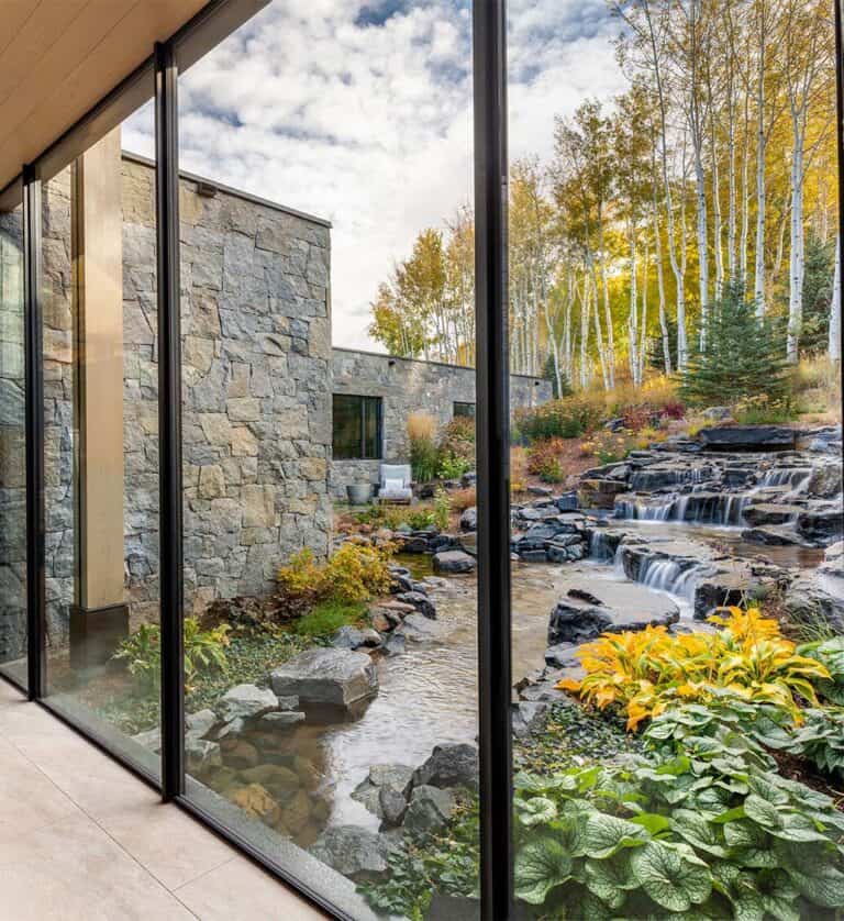 This thrilling Colorado mountain home embraces the natural topography
