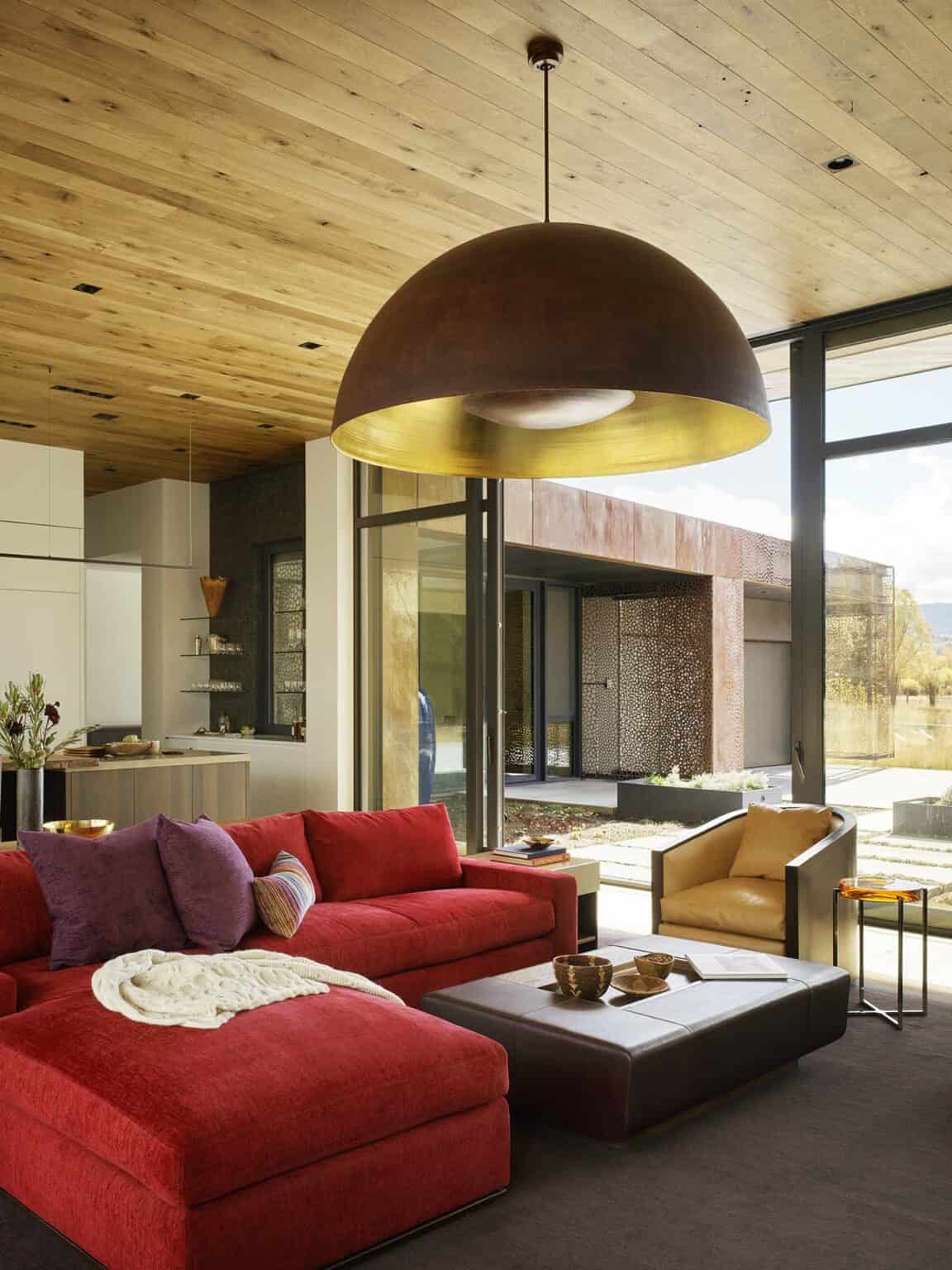 A steel and glass pavilion offers a serene guest house in Wyoming