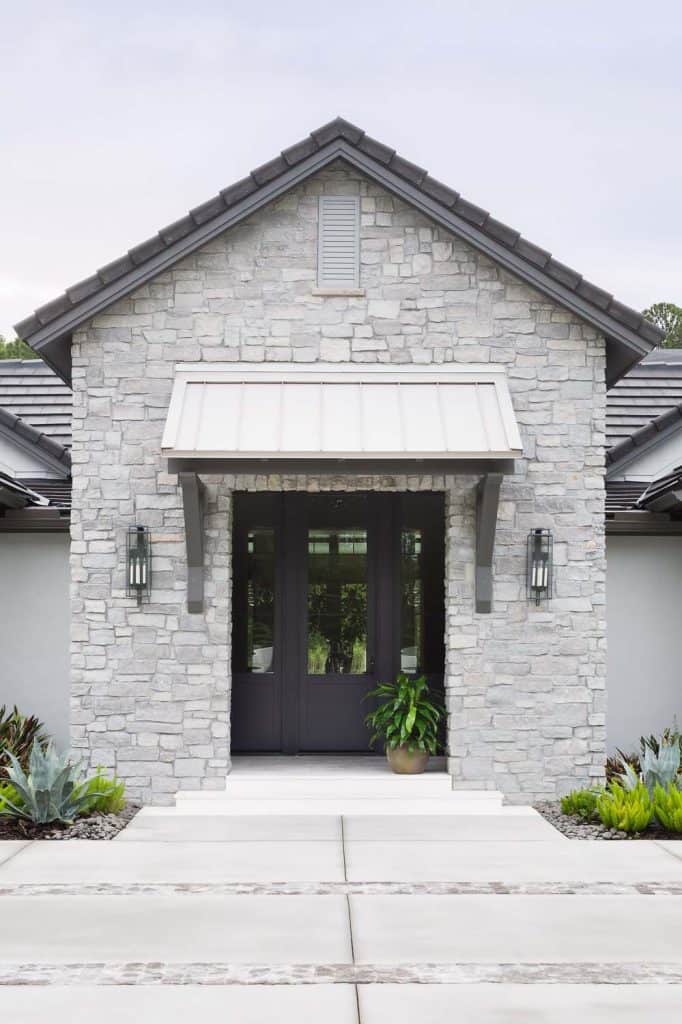 Step inside this glamorous modern farmhouse style home in Florida