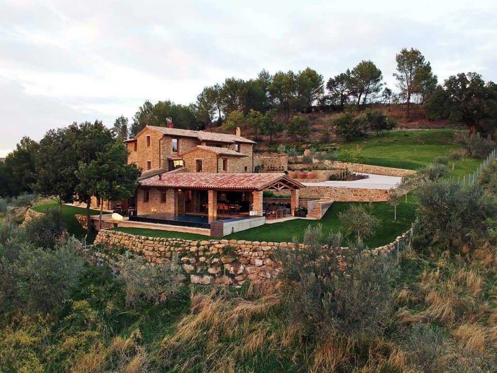 Step into a captivating restored stone house in the Italian countryside