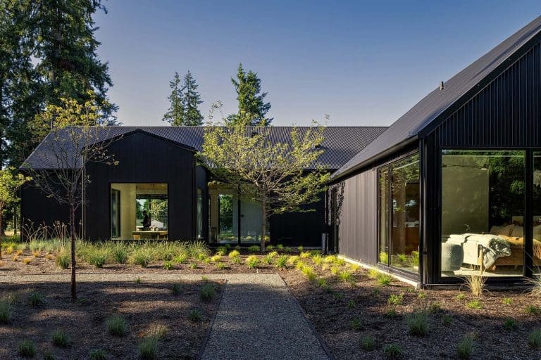 This Shou Sugi Ban house beautifully blends into Washington’s woodlands