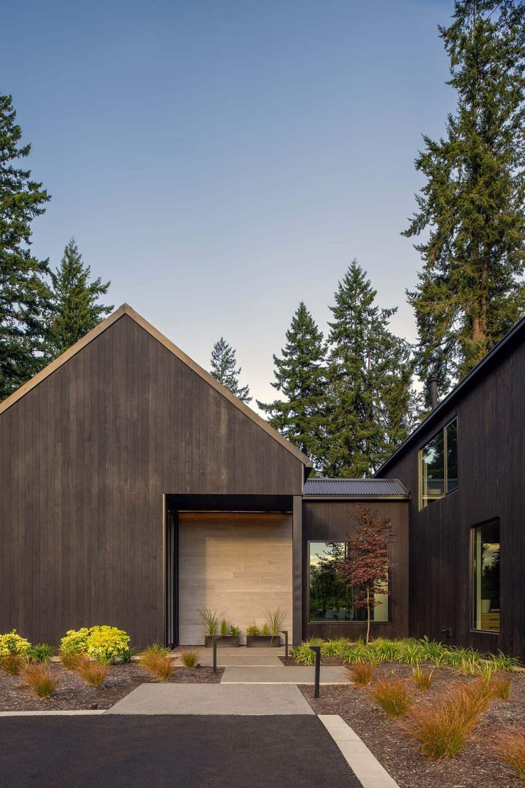 This Shou Sugi Ban house beautifully blends into Washington’s woodlands