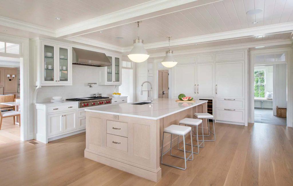 Step into this beautiful coastal Nantucket home designed for entertaining
