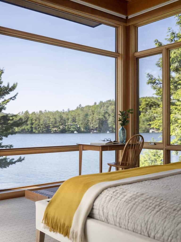 This extraordinary New Hampshire lake house is all about the serene views
