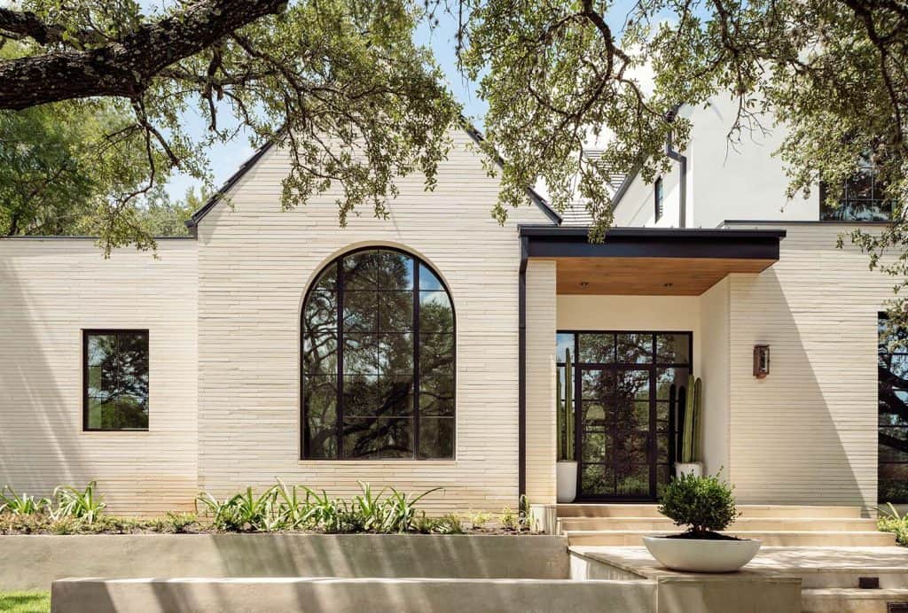 Step into this beautiful Austin home hidden amongst majestic live oaks