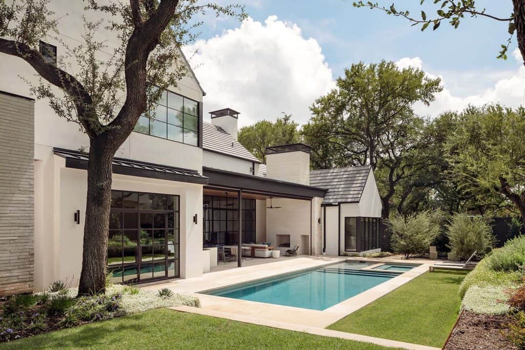 Step into this beautiful Austin home hidden amongst majestic live oaks