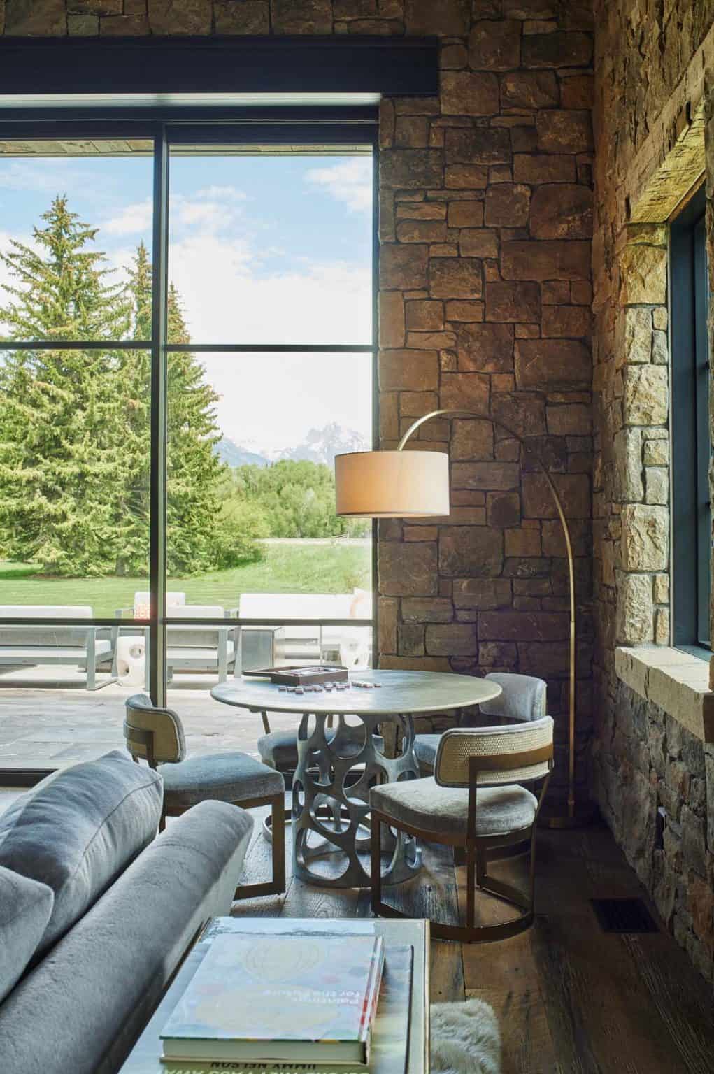 This incredible rustic house capitalizes on views of the Teton Mountains