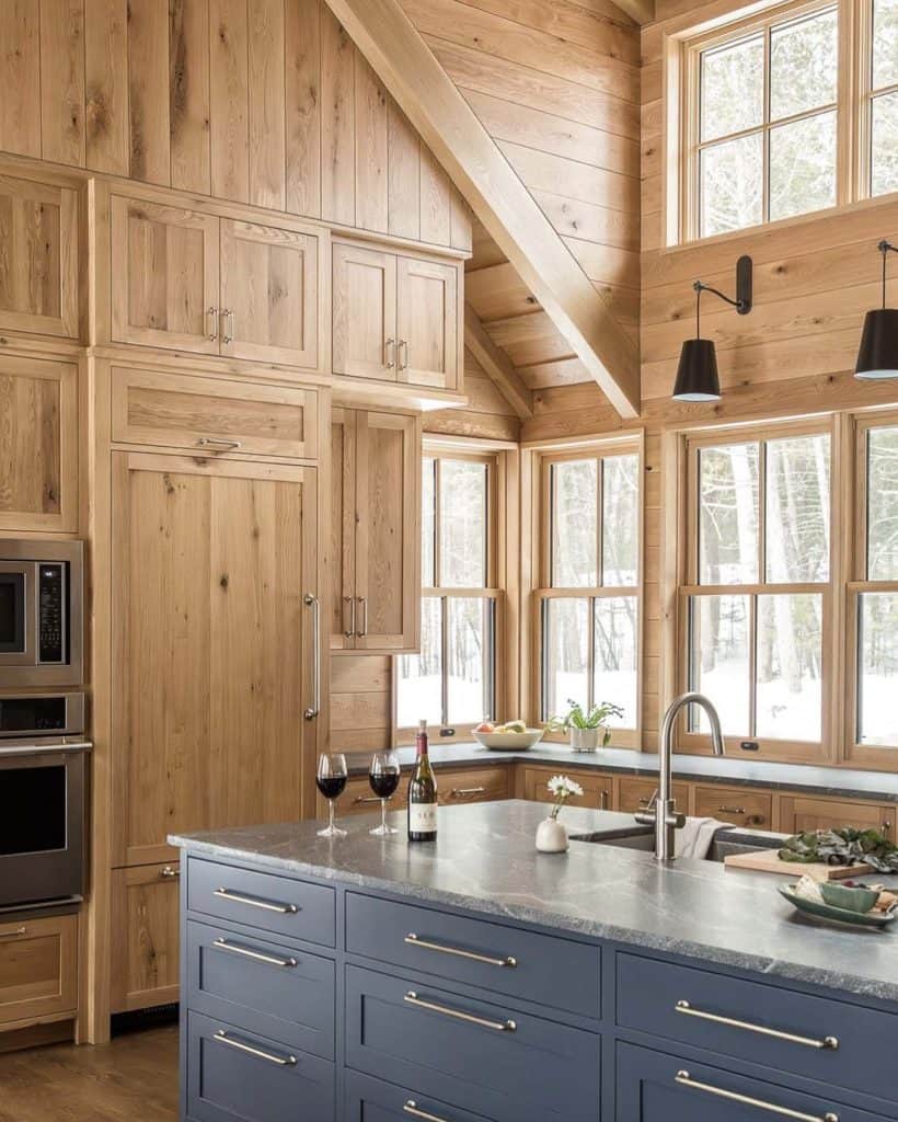 This rustic mountain home provides a peaceful escape in the woods of Maine