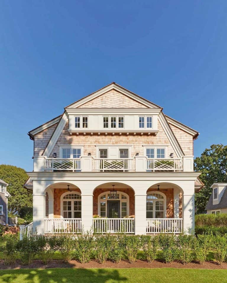 This shingle style cape home offers a serene getaway in Massachusetts