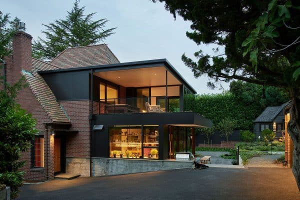 A stunning French Norman house gets a conservatory addition in Seattle