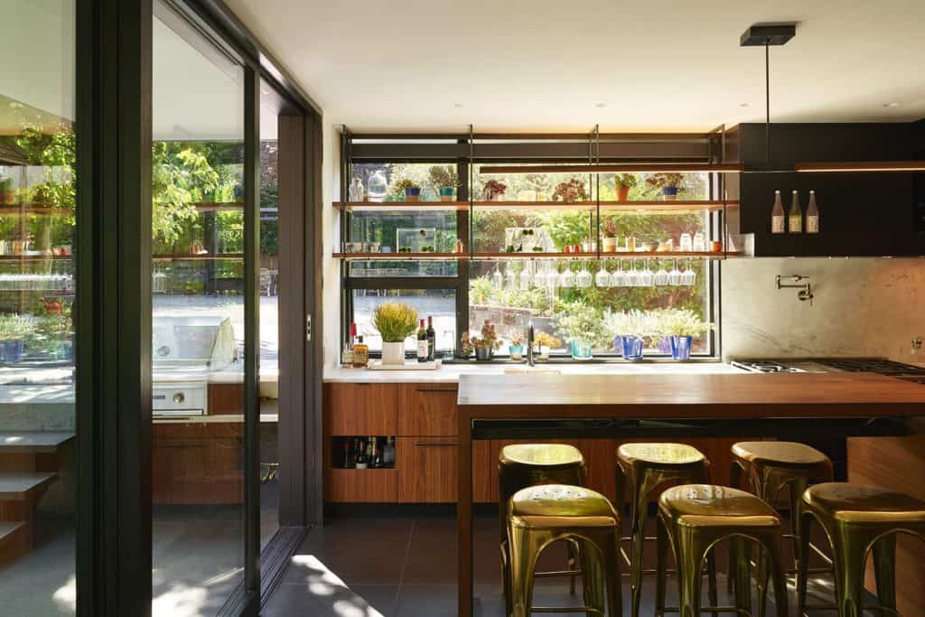 A stunning French Norman house gets a conservatory addition in Seattle