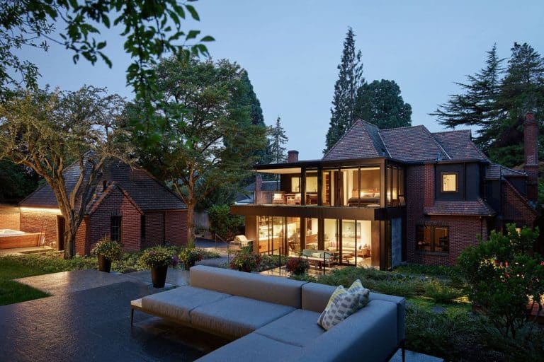 A stunning French Norman house gets a conservatory addition in Seattle
