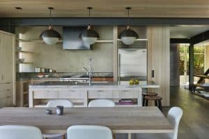 Stunning modern hideaway cantilevers over a bluff overlooking the ...