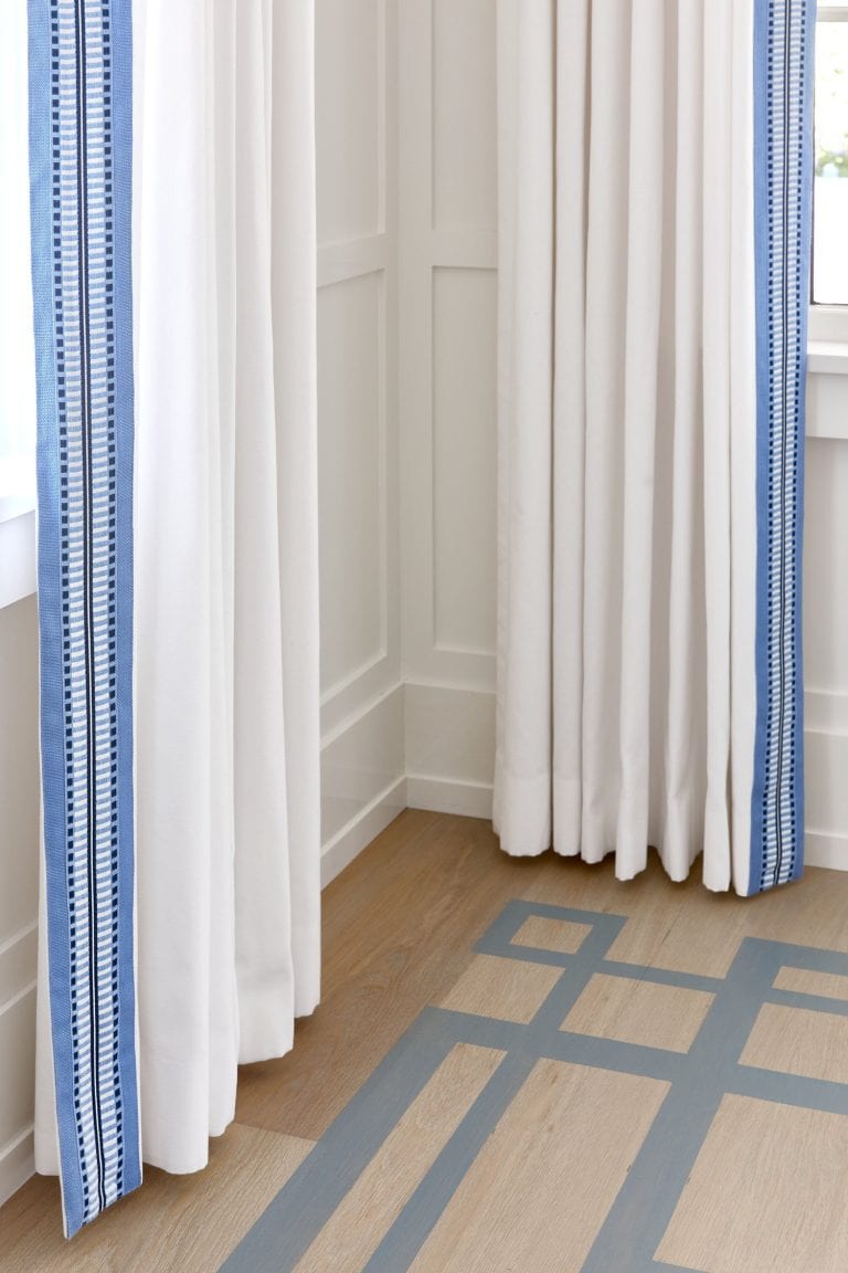 Nantucket home with a timeless and serene blue and white color scheme