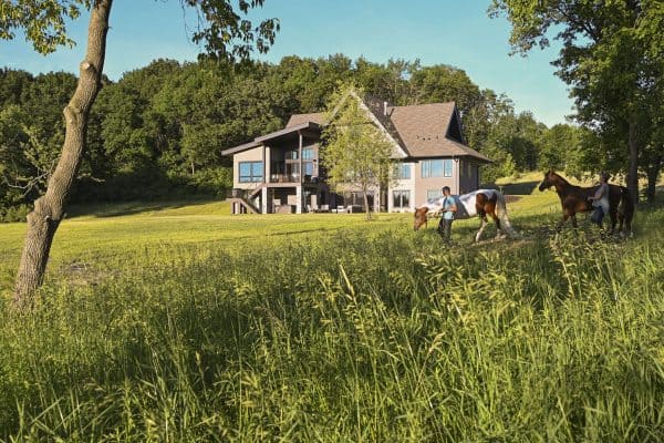 Step into this breathtaking modern ranch house in the Minnesota countryside