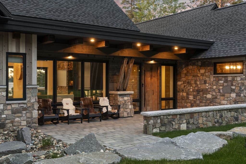 Step into this breathtaking rustic modern lake house in northern Minnesota