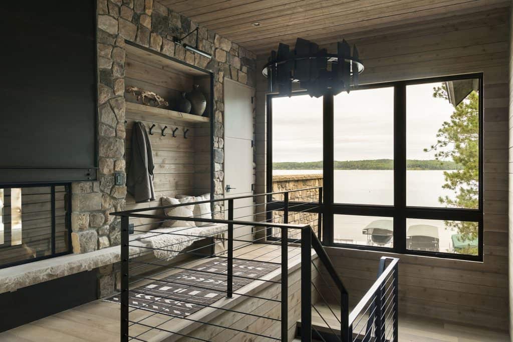 Step into this breathtaking rustic modern lake house in northern Minnesota