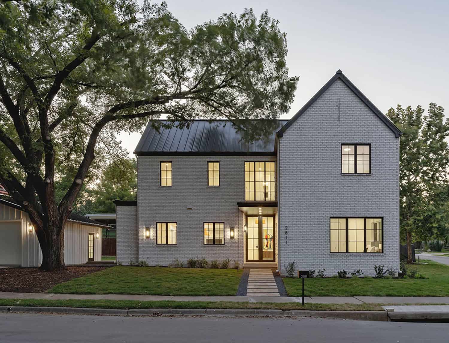 Sleek design details in this incredible white brick house in Austin