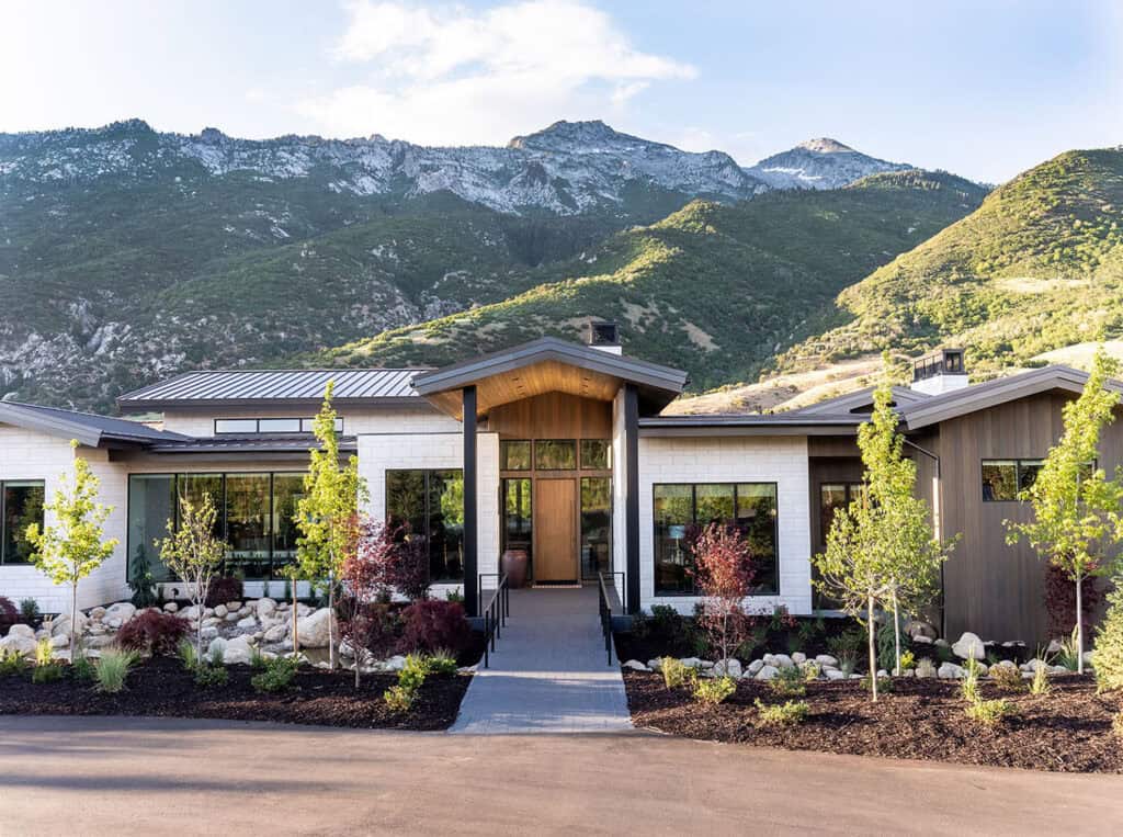 A gorgeous mountainside house with a dramatic backdrop of the Utah ...