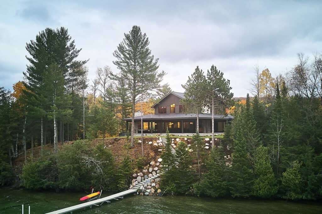 Inside a gorgeous mountain style cottage in Michigan with serene lake views