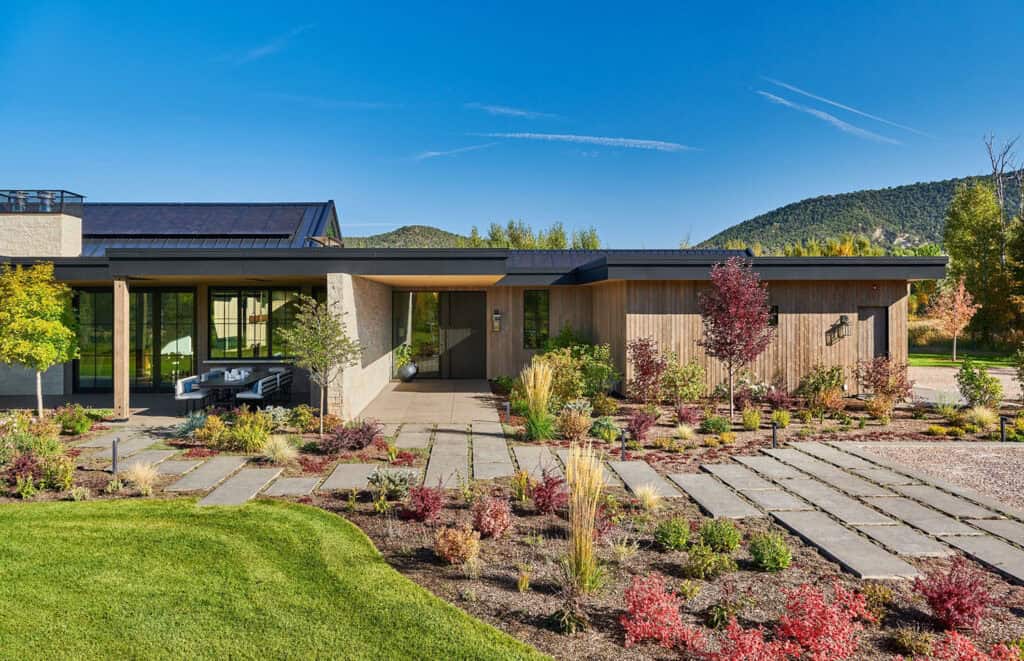 This serene riverfront house beautifully harmonizes with nature in Colorado