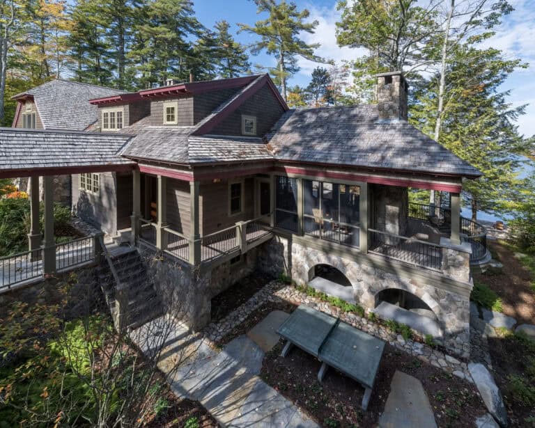 Tour this charming lakeside cottage on a picturesque New Hampshire lake