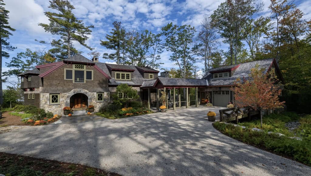 Tour this charming lakeside cottage on a picturesque New Hampshire lake