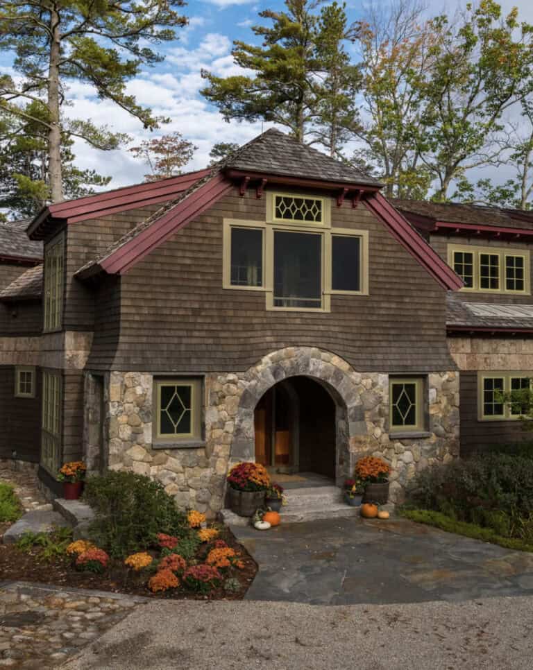 Tour this charming lakeside cottage on a picturesque New Hampshire lake