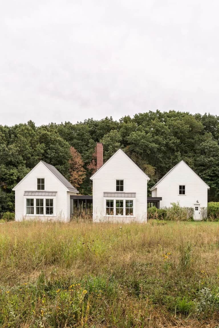 Inside a New England modern farmhouse with sweeping countryside views
