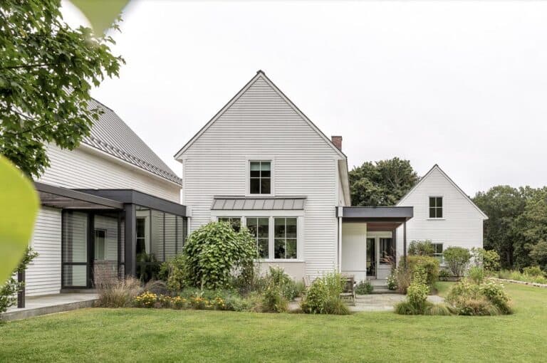 Inside a New England modern farmhouse with sweeping countryside views