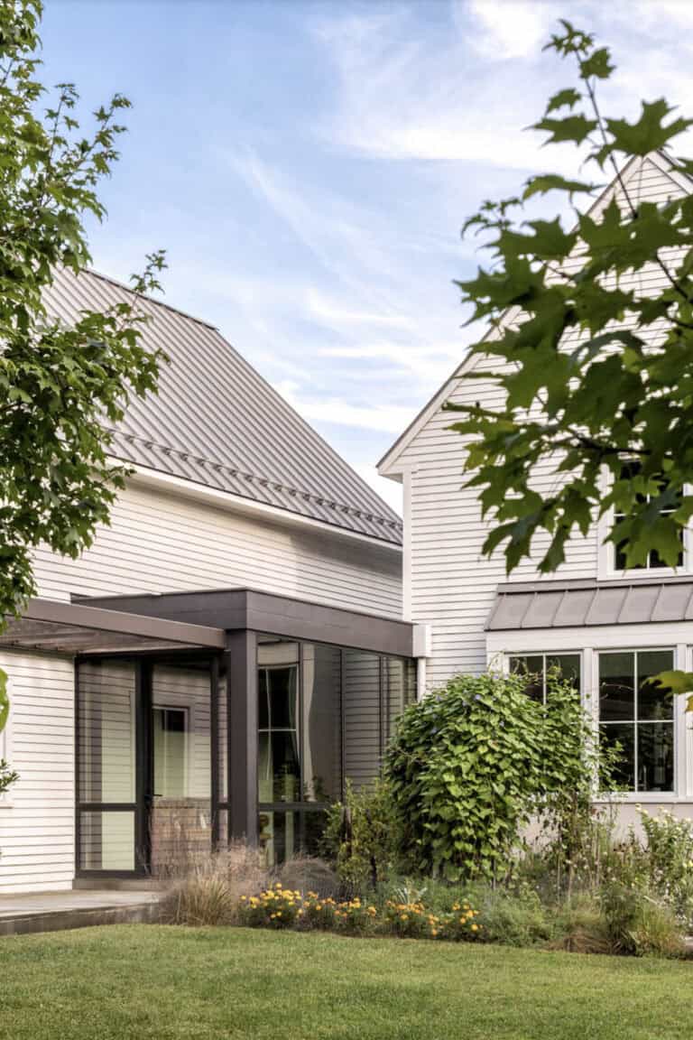 Inside a New England modern farmhouse with sweeping countryside views