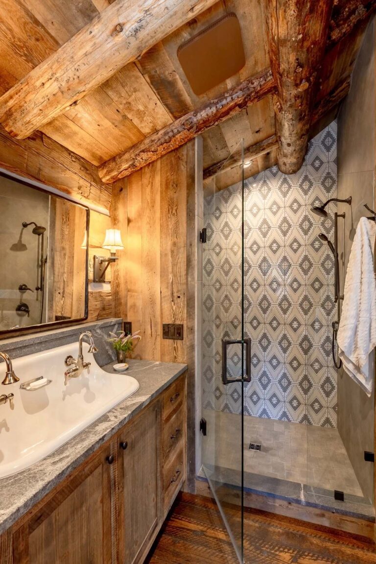 Historic Colorado log cabin gets a charming update in the towering pines