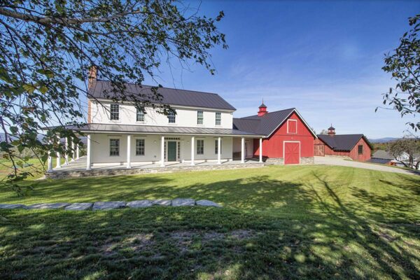 Step inside this Vermont modern farmhouse with idyllic mountain views