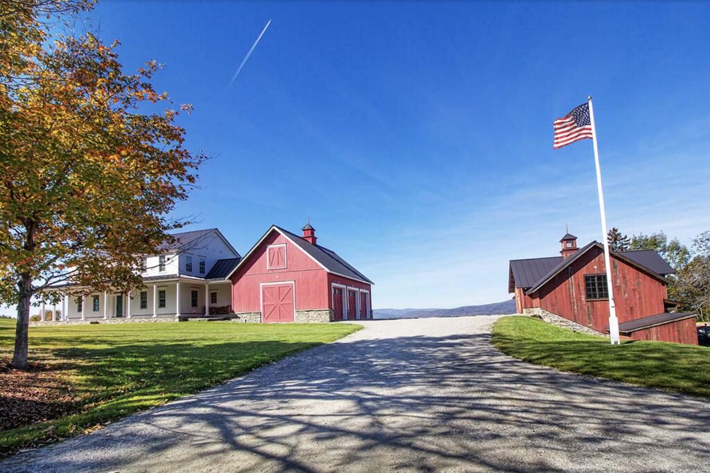 Step inside this Vermont modern farmhouse with idyllic mountain views