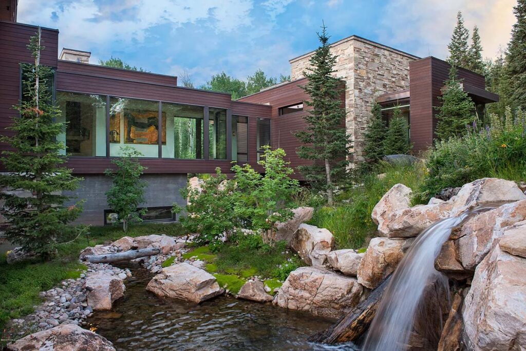 This phenomenal Park City home cantilevers over a tranquil water feature