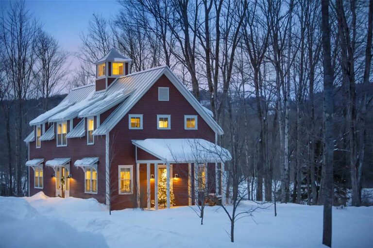 Tour this warm and cozy barn house in the snowy mountains of Vermont