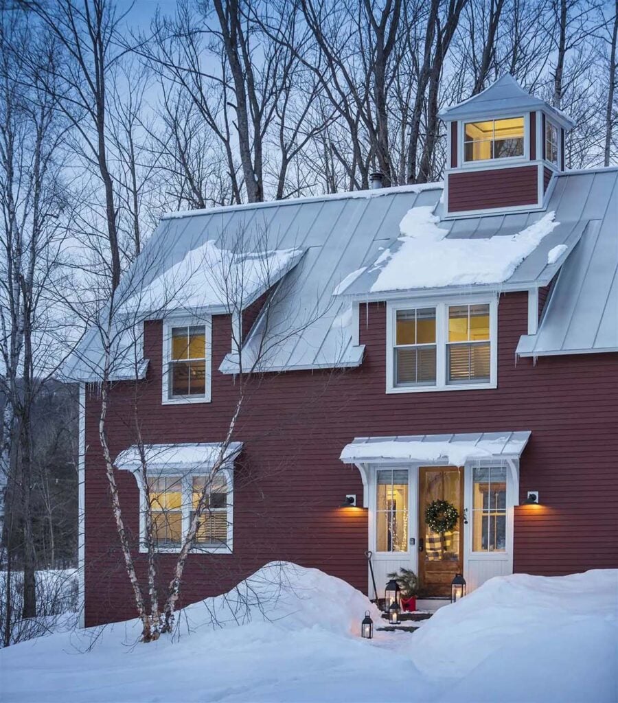 Tour this warm and cozy barn house in the snowy mountains of Vermont