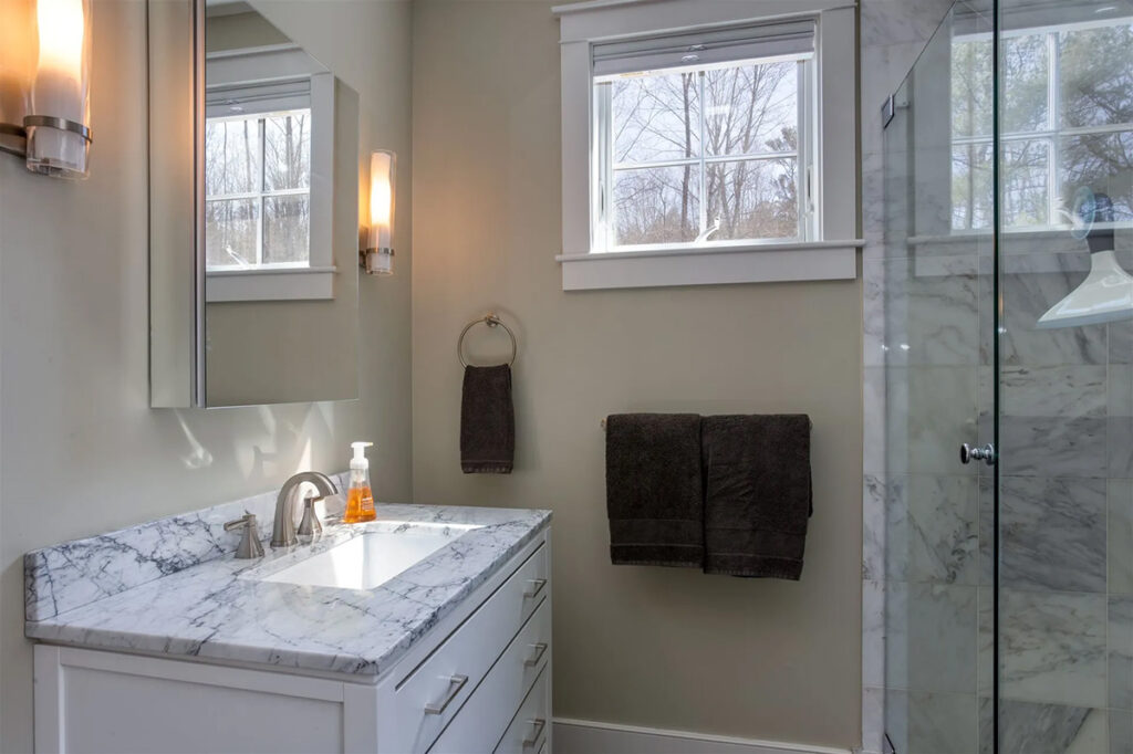 Tour this warm and cozy barn house in the snowy mountains of Vermont