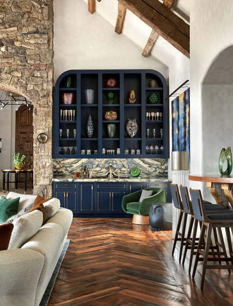 This mountain lodge-style home boasts amazing views of the Rocky Mountains