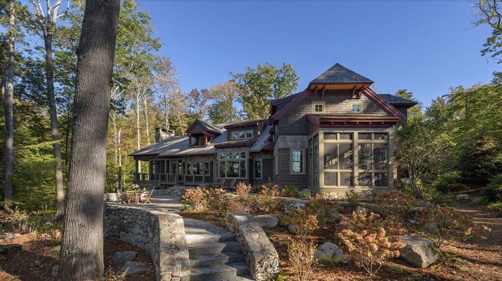 A rustic New Hampshire lake house with privileged views of Lake ...