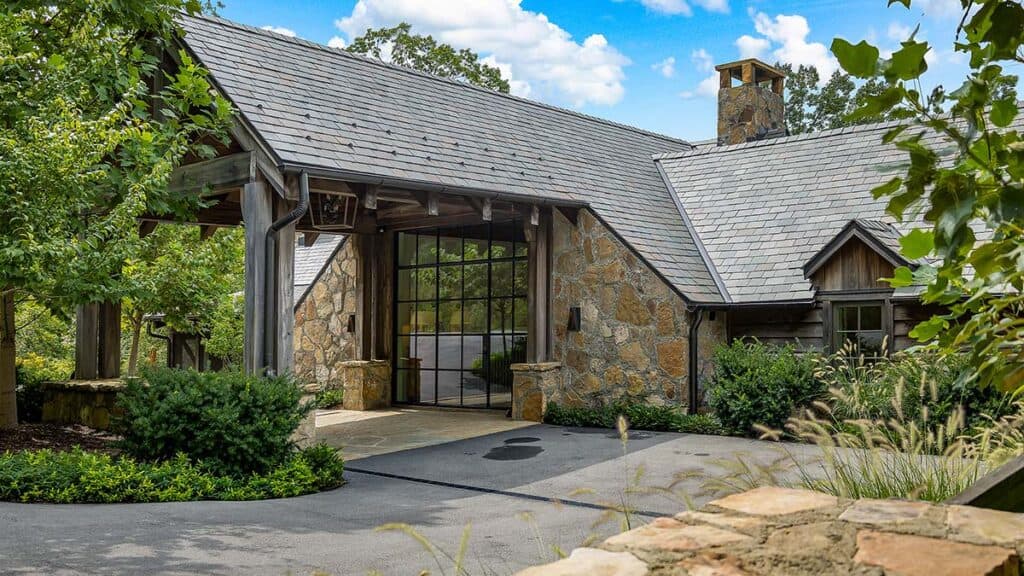 See this rustic modern stone house cradled in the Great Smoky Mountains