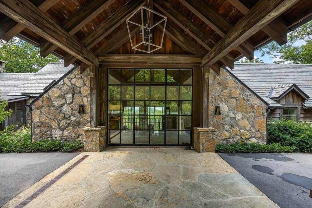 See this rustic modern stone house cradled in the Great Smoky Mountains