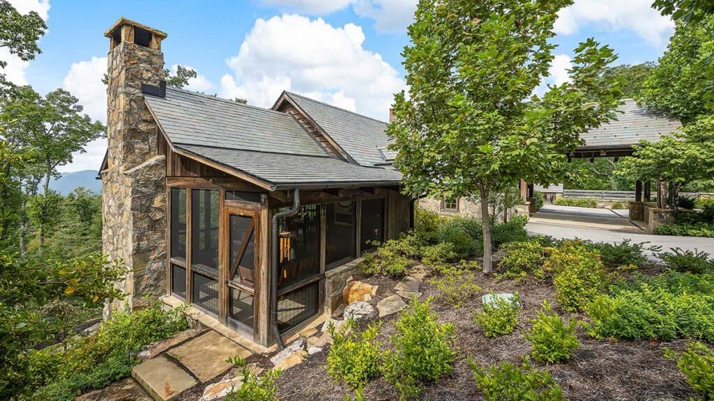 See this rustic modern stone house cradled in the Great Smoky Mountains