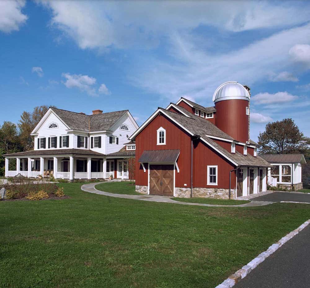 Tour a stunning Connecticut farmhouse with an attached barn and lake views