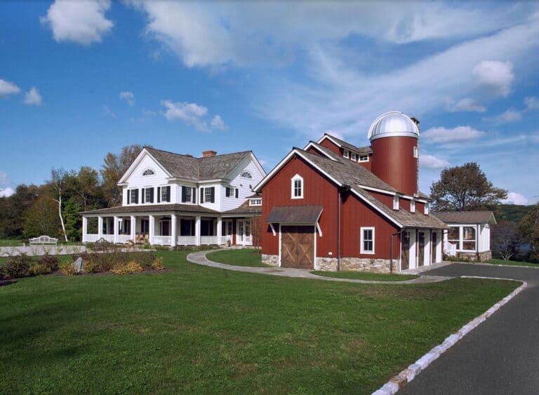 Tour a stunning Connecticut farmhouse with an attached barn and lake views