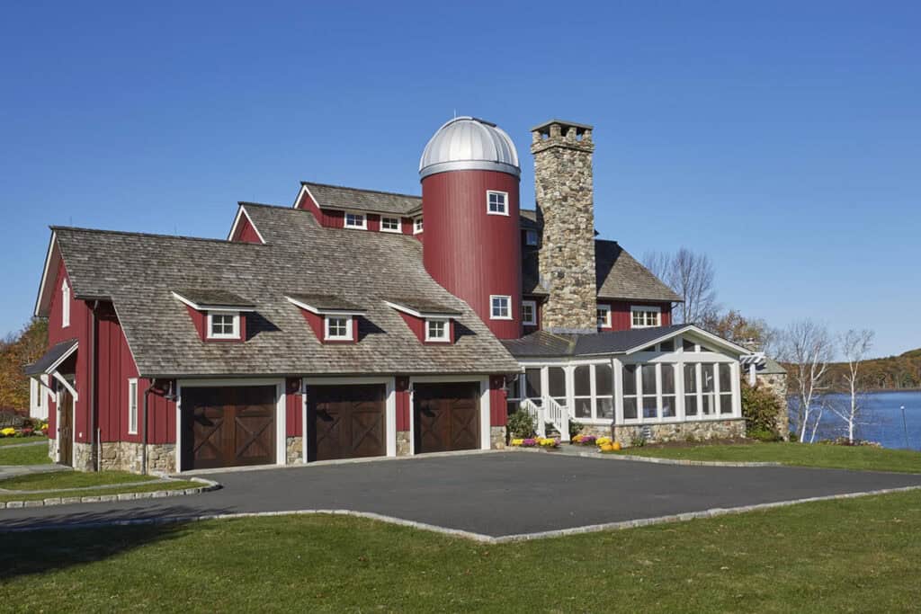 Tour a stunning Connecticut farmhouse with an attached barn and lake views