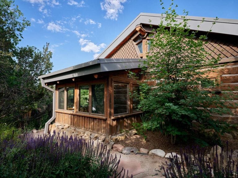 Historic log cabin barns get transformed into a charming Santa Fe home