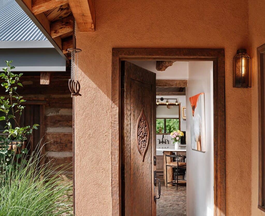 Historic log cabin barns get transformed into a charming Santa Fe home